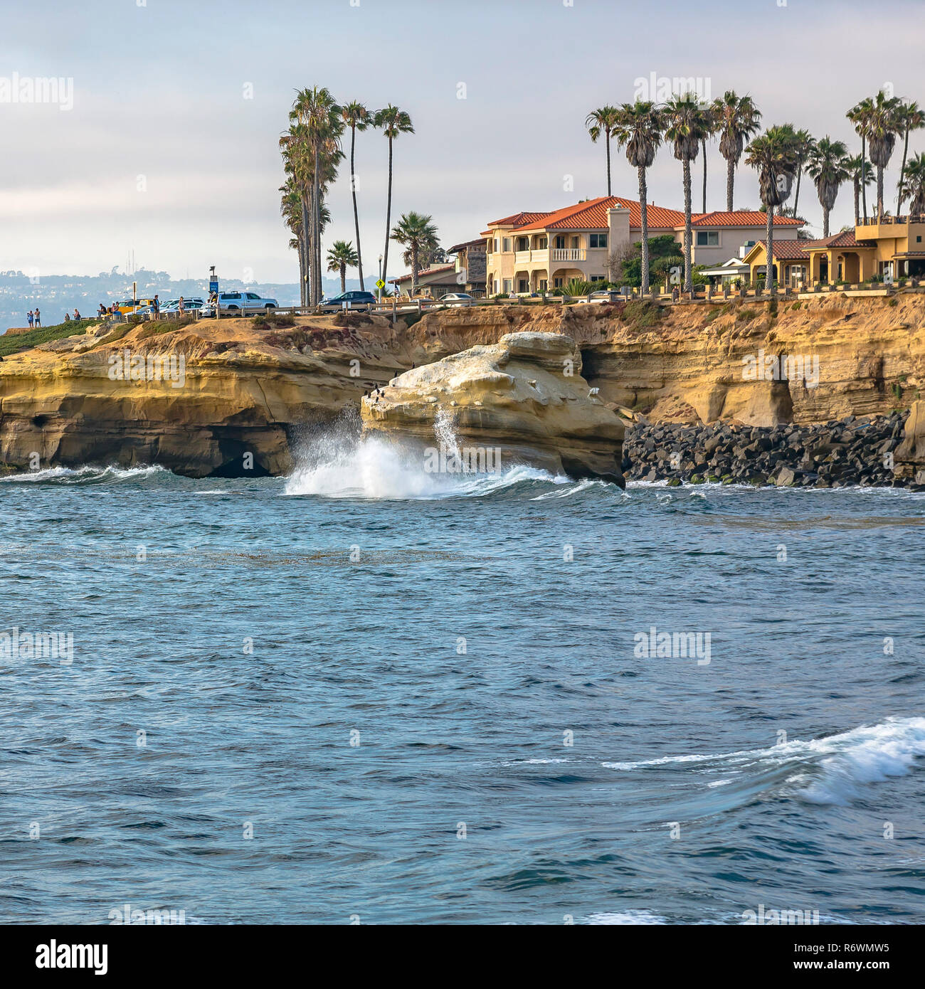 Waves crashing on sheer cliffs in La Jolla beach Stock Photo - Alamy