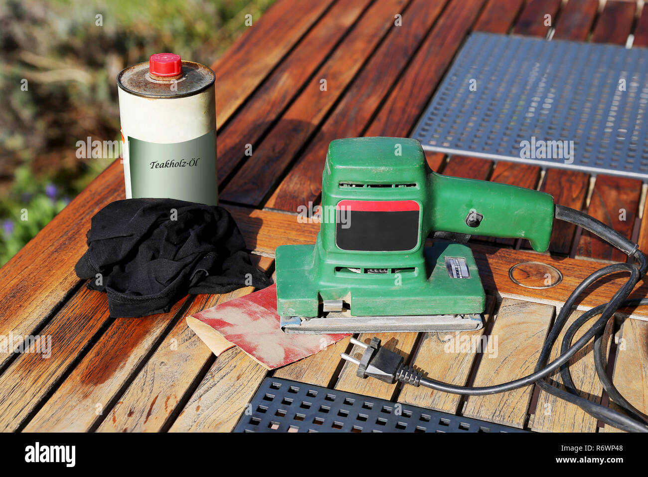grinder,sandpaper and wood oil Stock Photo - Alamy