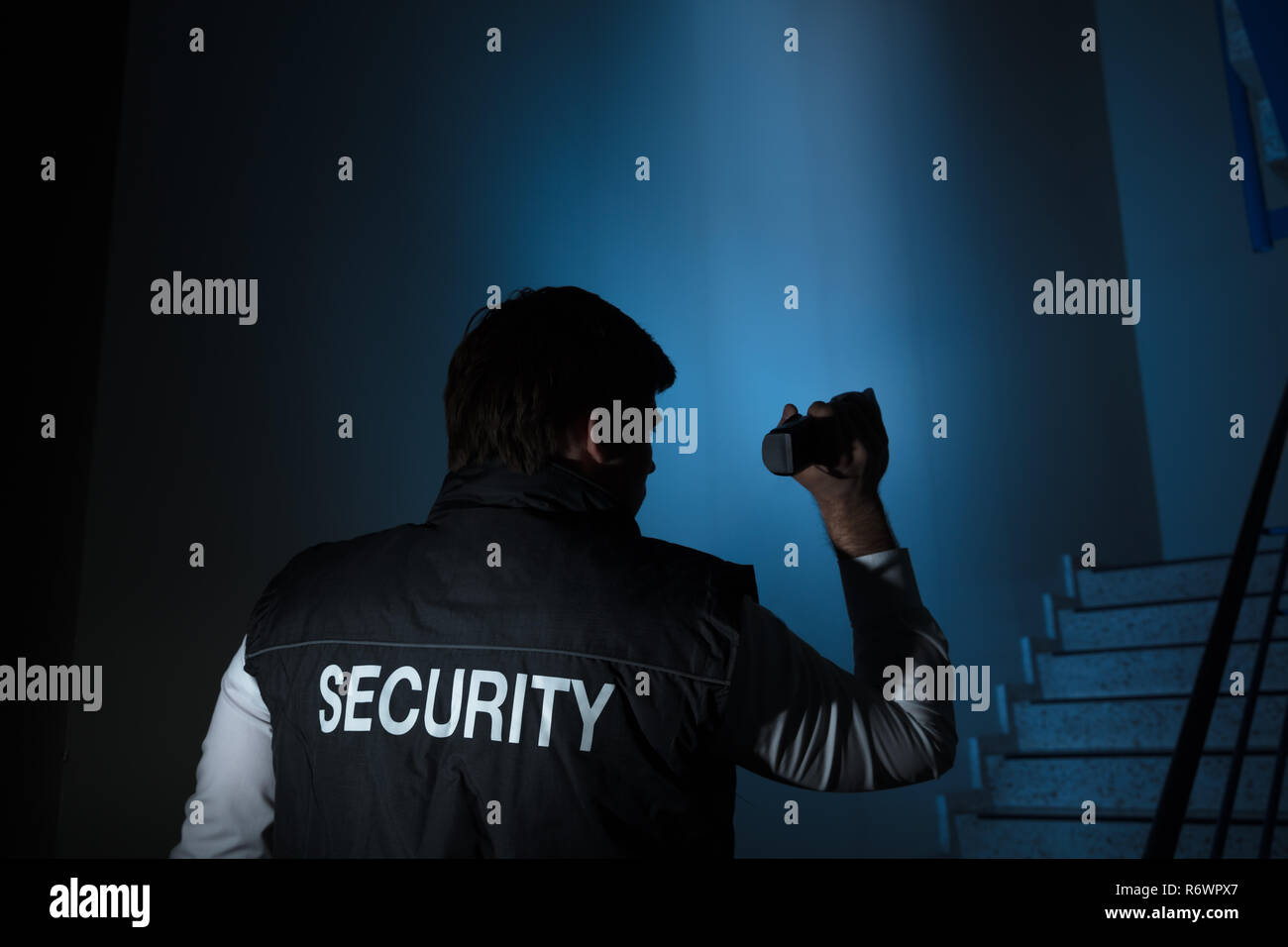 Security Guard Standing Near Stairway Stock Photo - Alamy