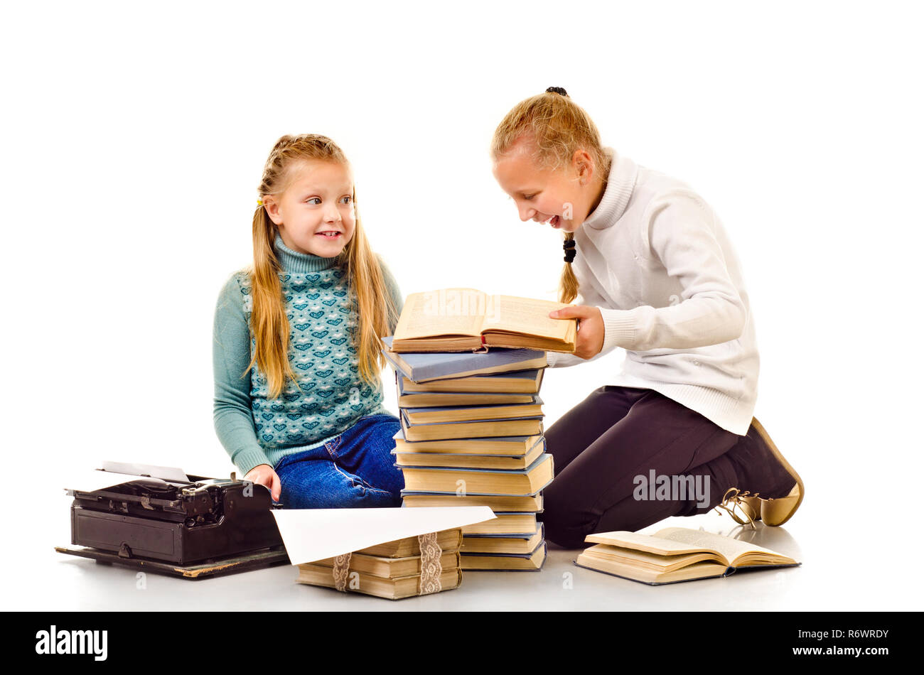 Person reading two books hi-res stock photography and images - Alamy