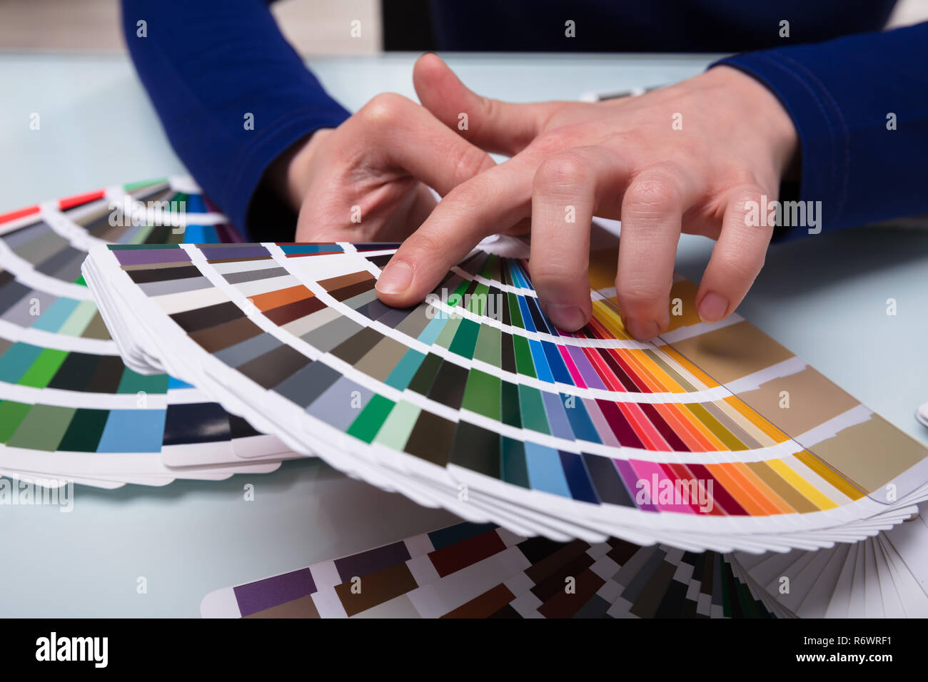 Designer Choosing Color From Color Swatches Stock Photo - Alamy
