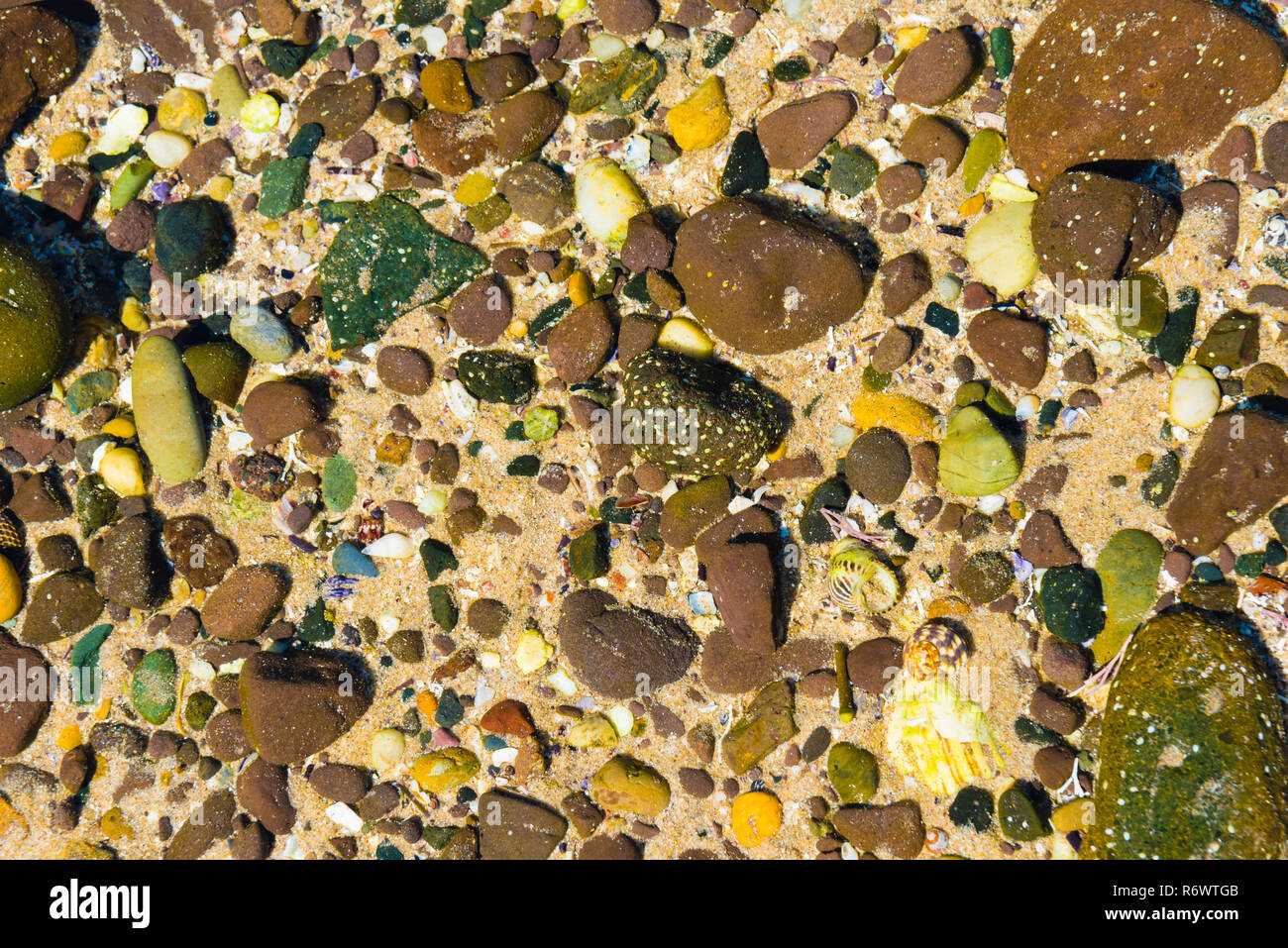 Nature abstract background with colourful rocks in water sand Stock ...