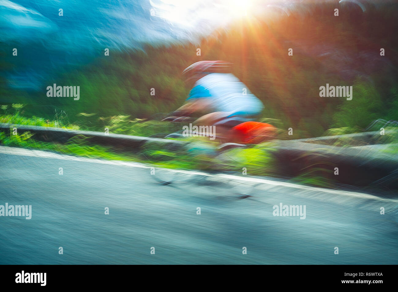 Motion blur pro cyclist hi-res stock photography and images - Alamy
