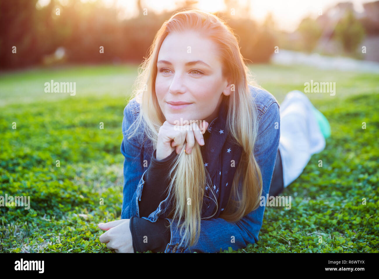 Cute female on the spring meadow Stock Photo - Alamy
