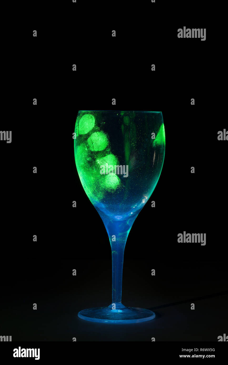 Thumb print fingerprints on wine glass showing up under blacklight ...