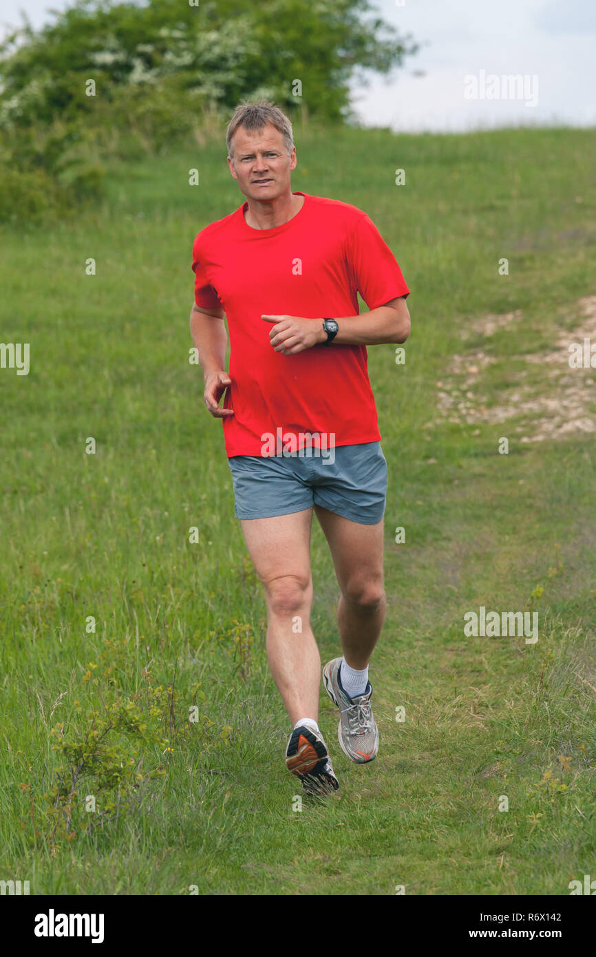 Moving quickly young adult hi-res stock photography and images - Alamy