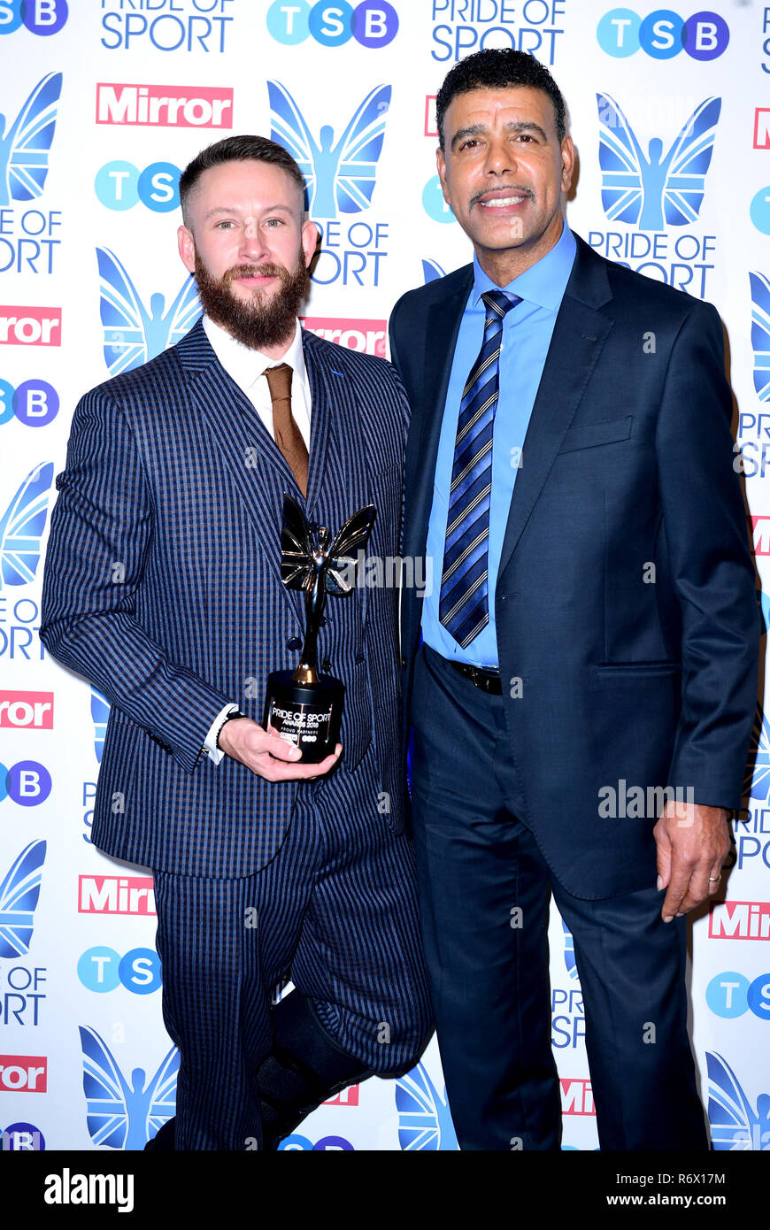 Ali Hay (left) with his TSB Community Partner Award presented by Chris ...