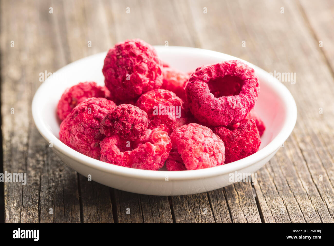 Freeze dried raspberries Stock Photo - Alamy