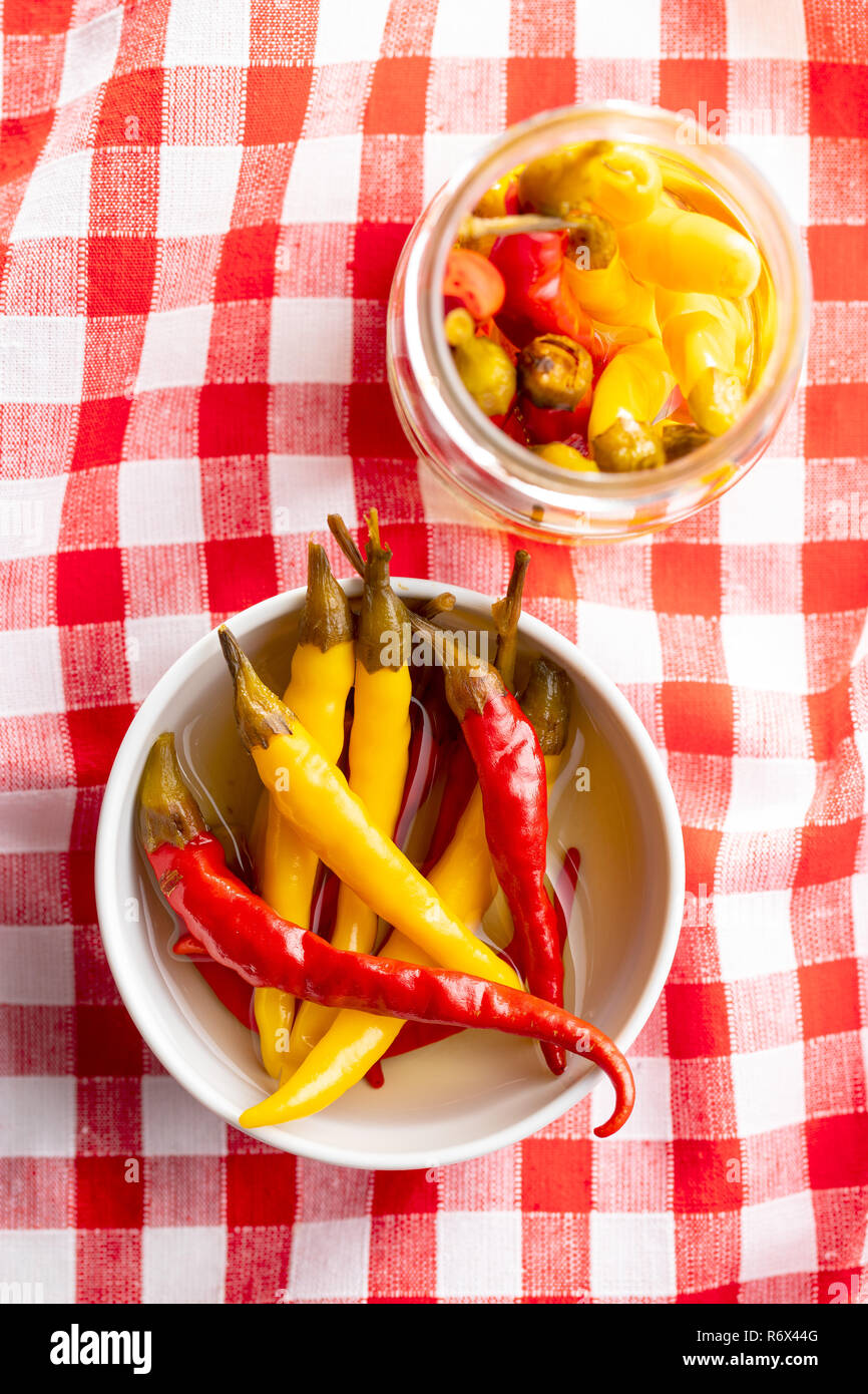 Pickled hot chili peppers Stock Photo - Alamy
