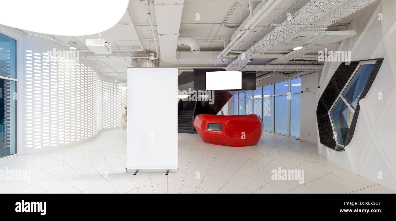 Blank roll up banner stand and reception desk in contemporary office ...
