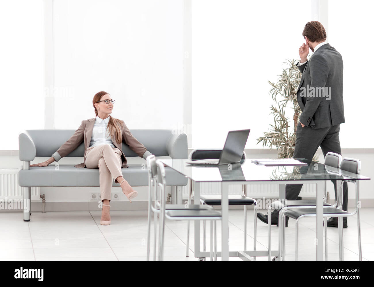 colleagues meet in the office reception Stock Photo - Alamy