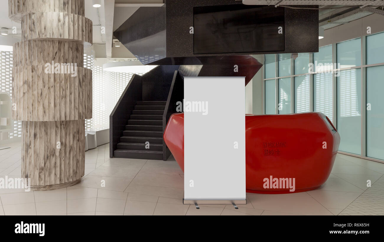 Blank roll up banner stand in office interior with reception desk and ...