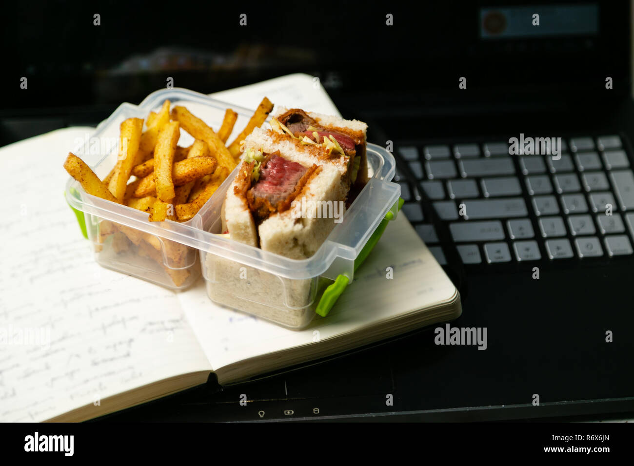 Bento at workplace with Katsu Sando food trend japanese sandwich with ...