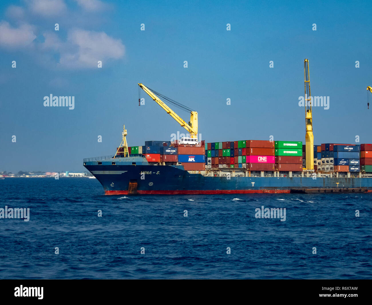 Container ships in the port of Male in the Maldives Stock Photo - Alamy