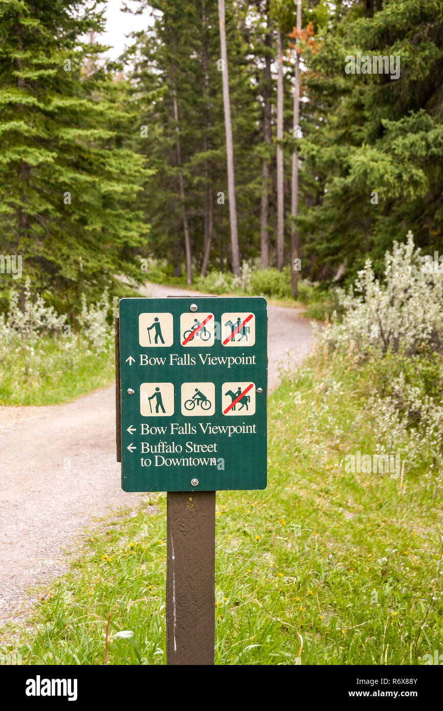 BANFF, ALBERTA, CANADA - MAY 2018: Sign alongside a footpath in Banff ...