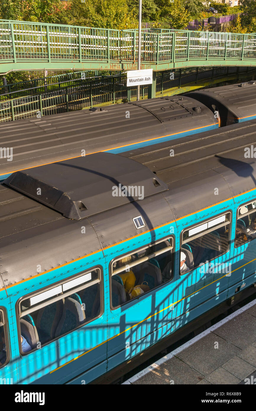 MOUNTAIN ASH, WALES - OCTOBER 2018: Two commuter trains side by side at ...