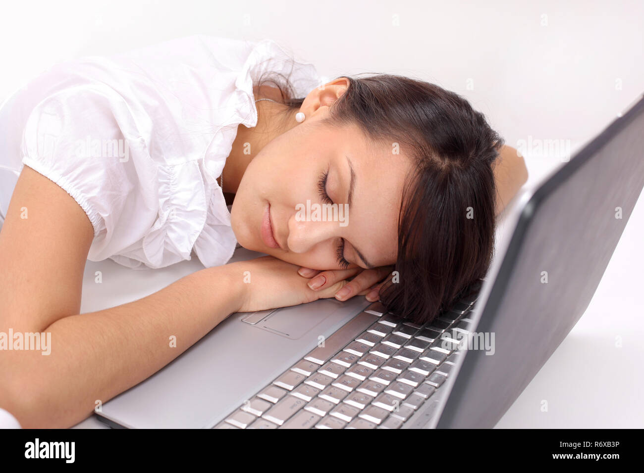 Woman sleeping on keyboard laptop hi-res stock photography and images ...