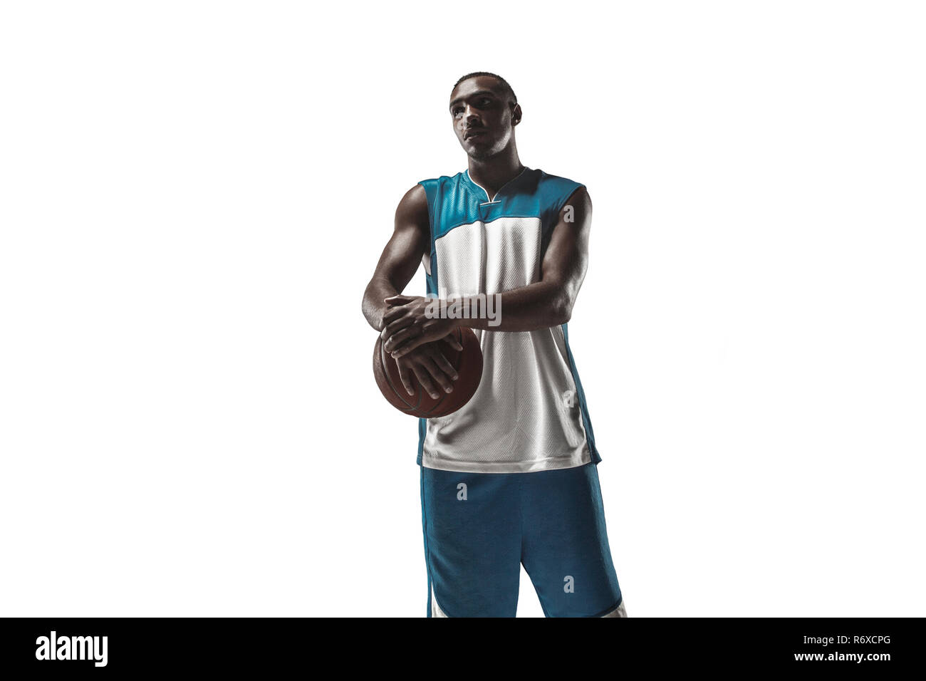 The portrait of a basketball player with ball Stock Photo - Alamy
