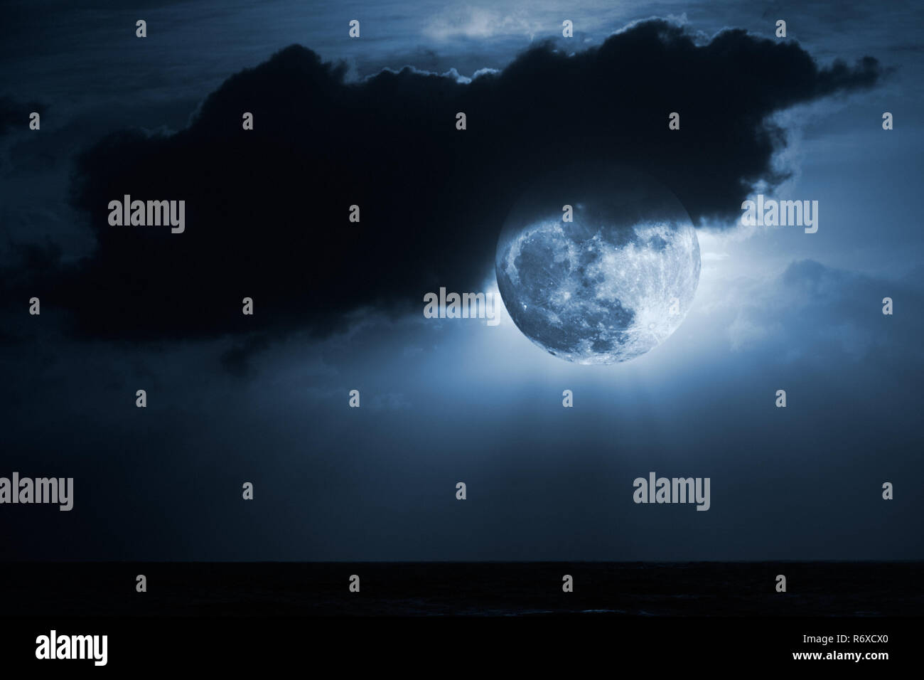 Cloudy moonlit night sky hi-res stock photography and images - Alamy