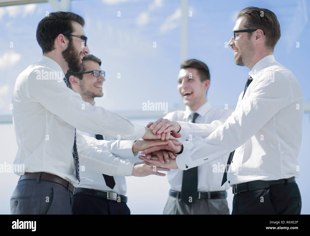 employees of the company showing their unity Stock Photo - Alamy
