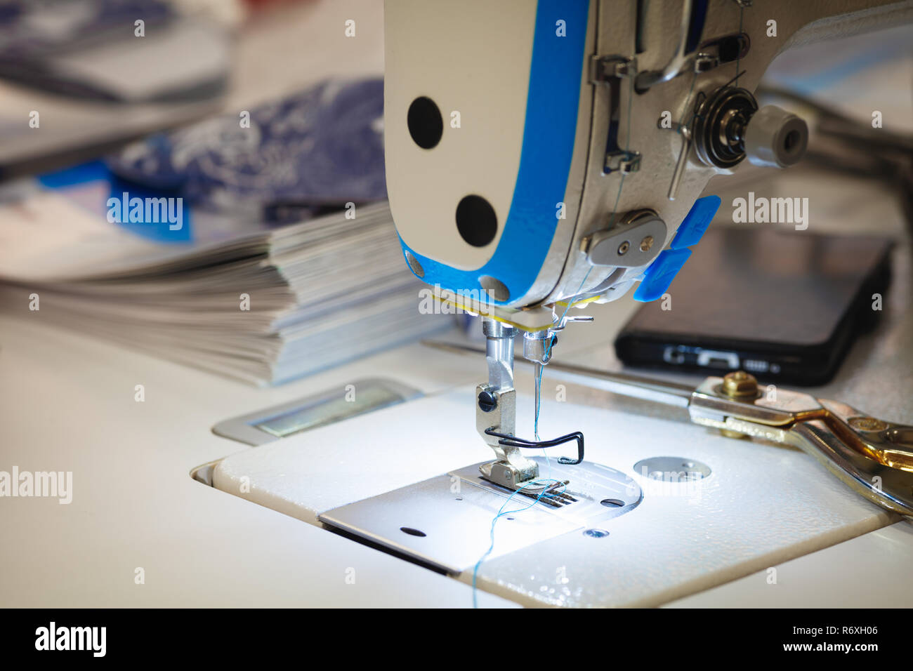Close-up sewing machine working part ready to work Stock Photo - Alamy