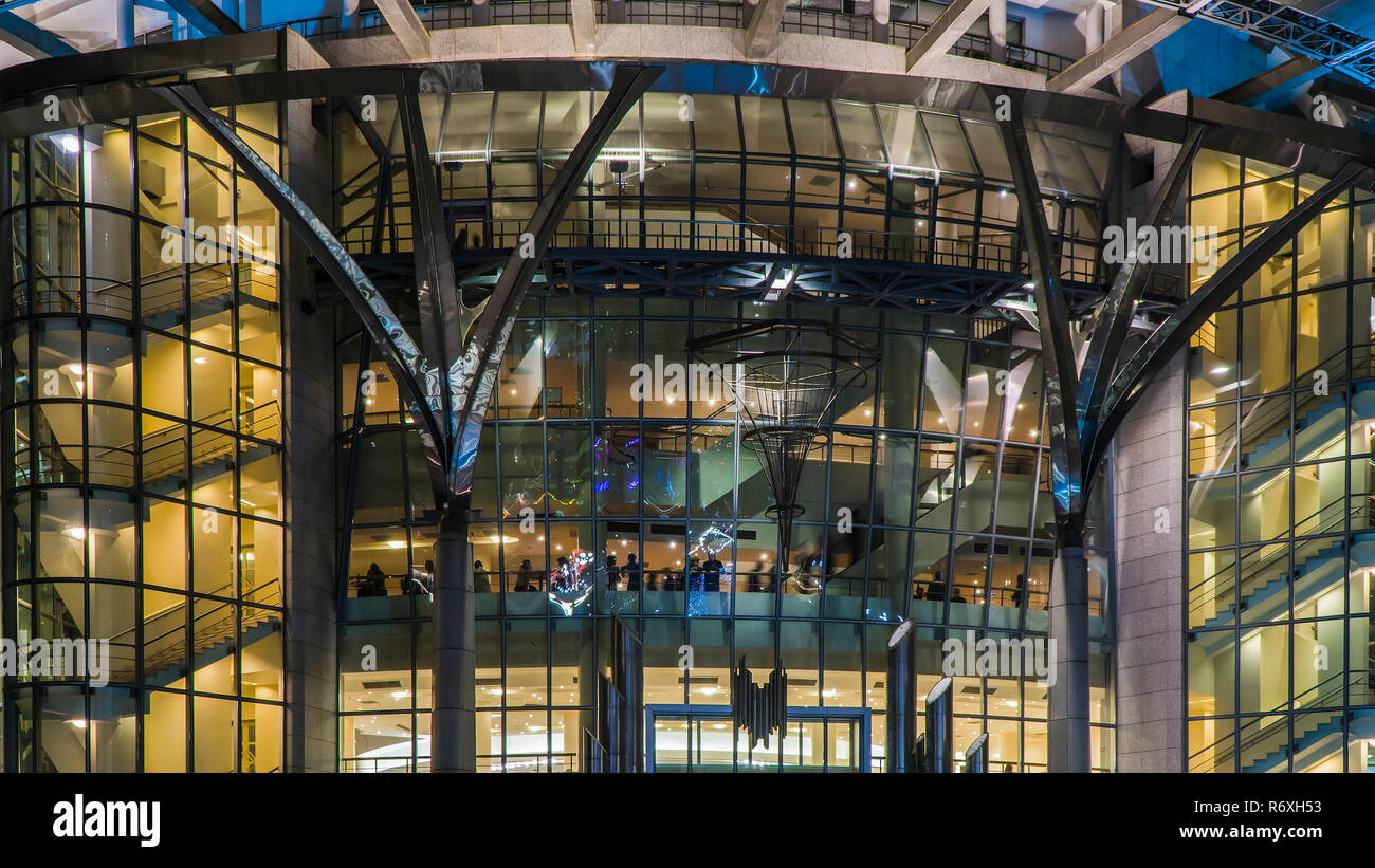 silhouettes of people in the lobby of a modern concert hall Stock Photo ...