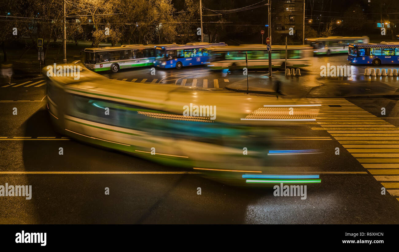 passengers waiting and boarding buses at the bus terminal Stock Photo ...
