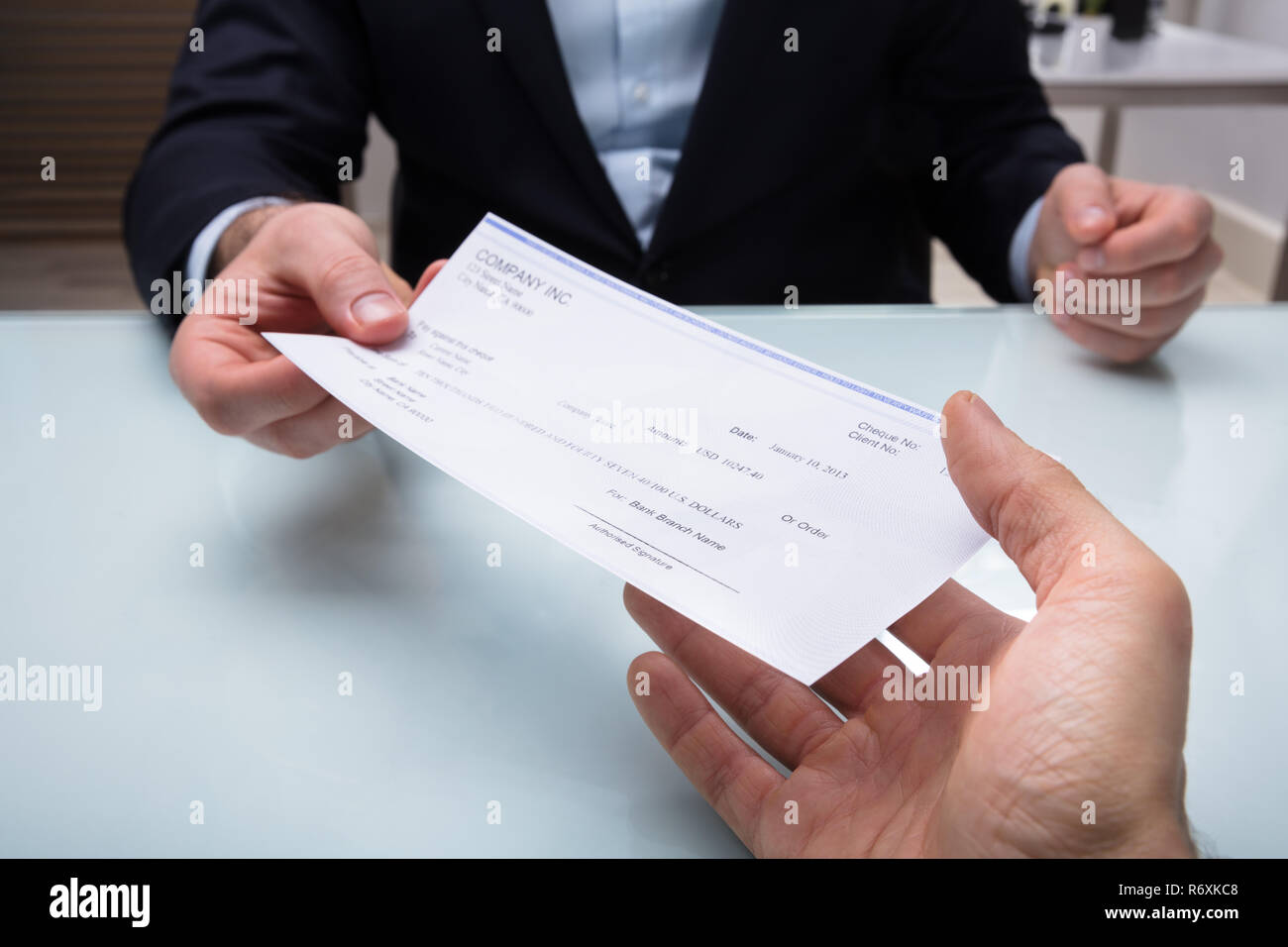 Giving cheque hi-res stock photography and images - Alamy