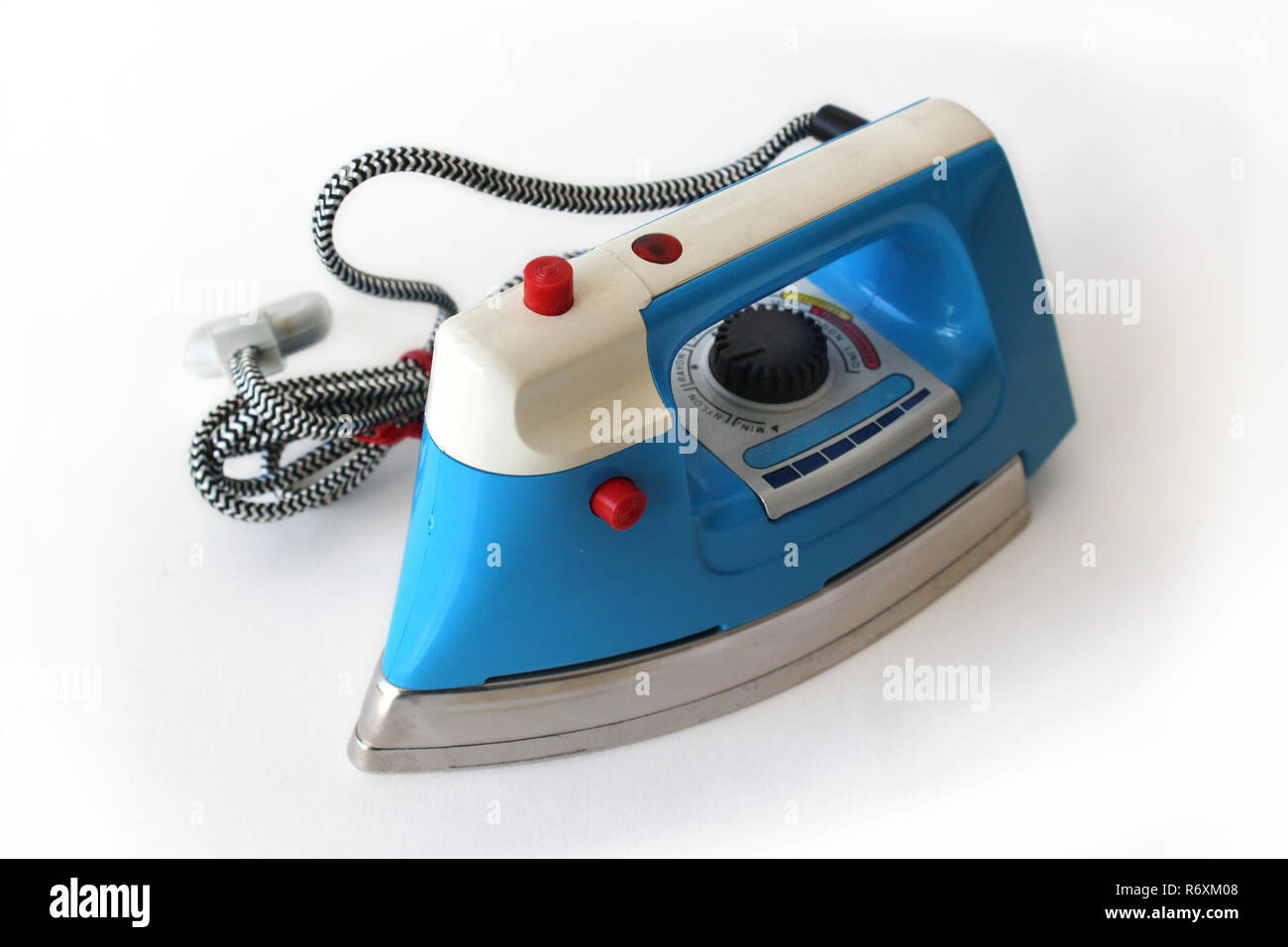 Toy iron isolated on a white background Stock Photo - Alamy