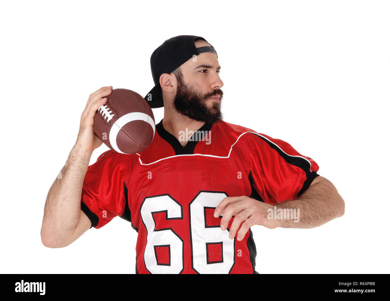 Closeup of a football player with his football in his hand Stock Photo ...