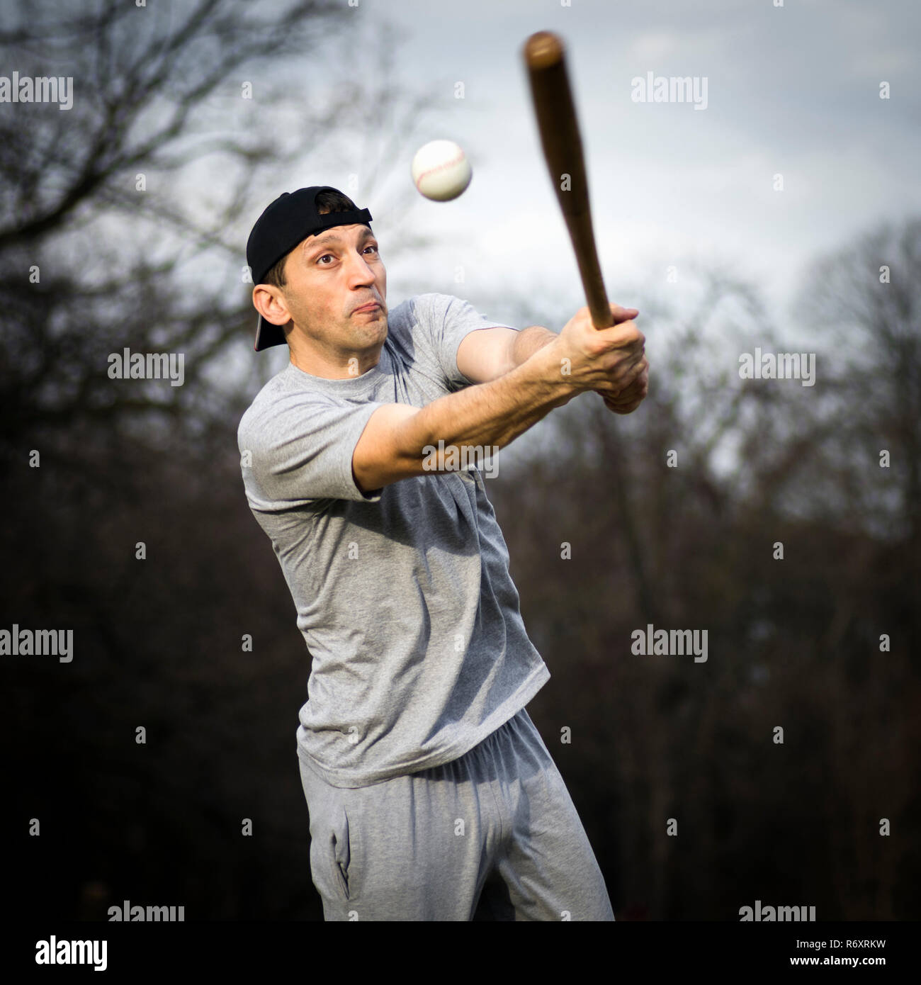 playing baseball player Stock Photo - Alamy