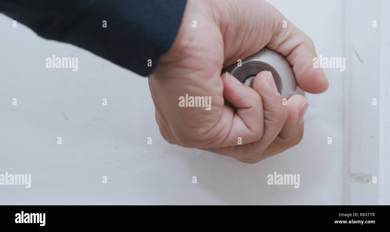 Women hand open door knob hi-res stock photography and images - Alamy