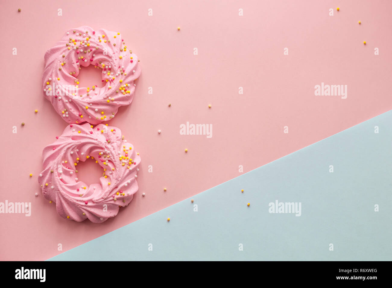 number eight pink cookies and background Stock Photo - Alamy