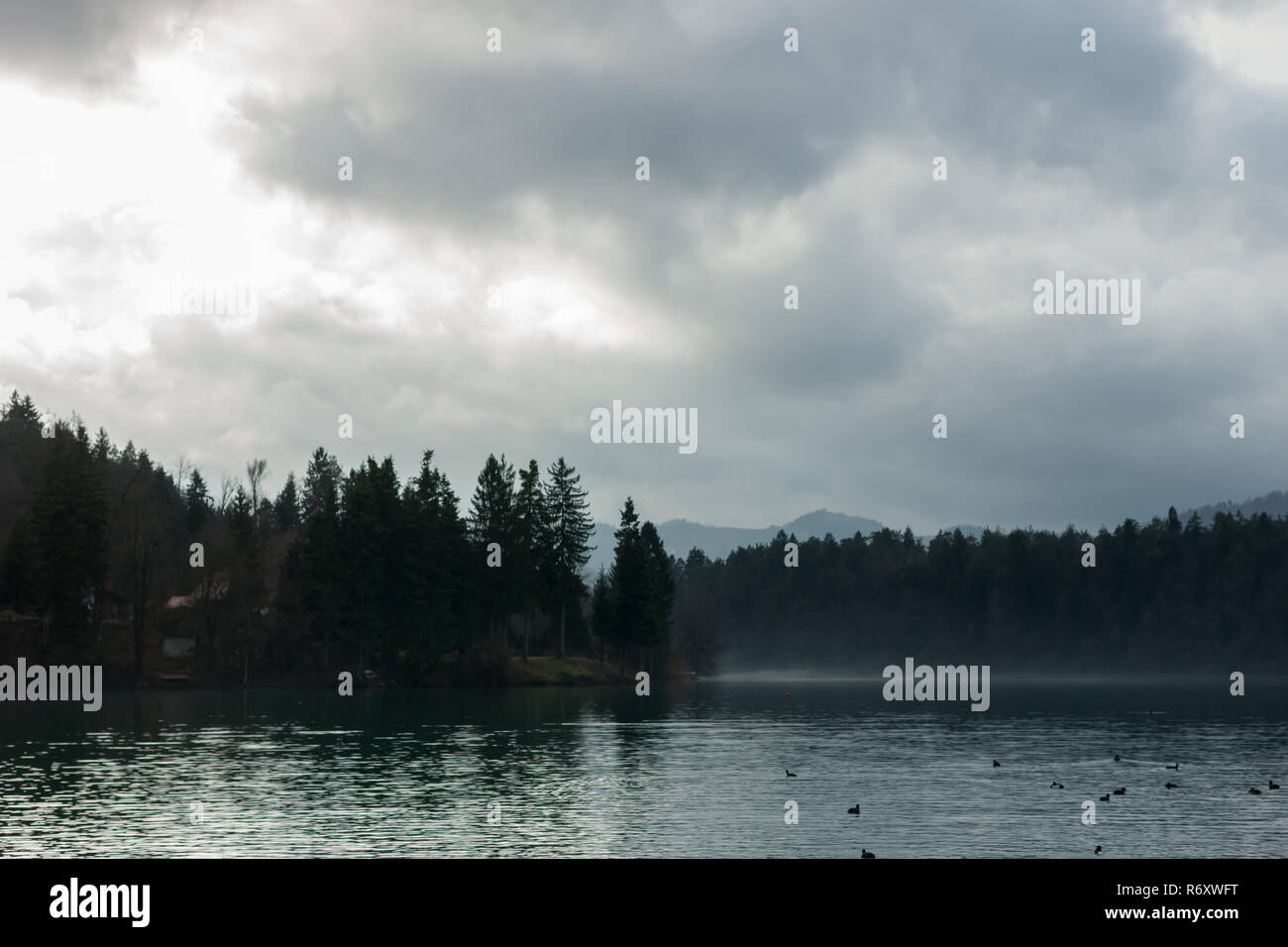 cloudy lake landscape Stock Photo - Alamy
