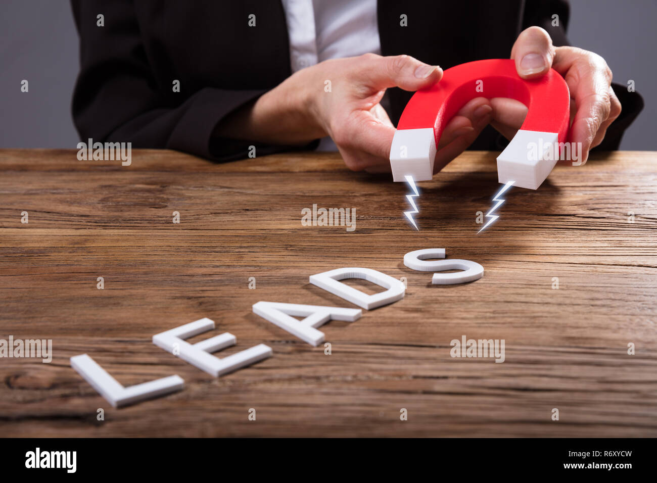 Hand holding horseshoe magnet hi-res stock photography and images - Alamy