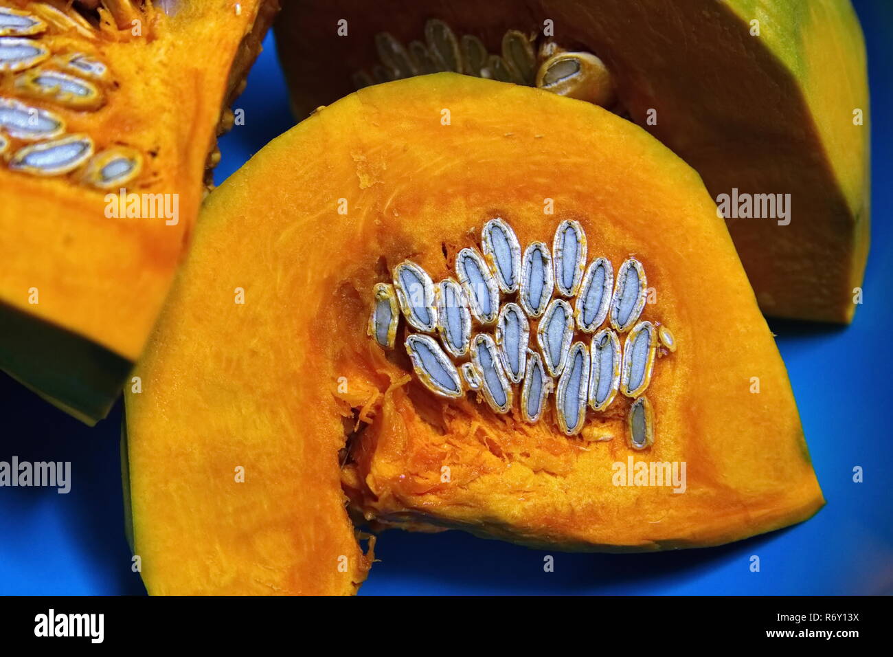 A sliced pumpkin ready for a healthy recipe rich in fiber and vitamins ...
