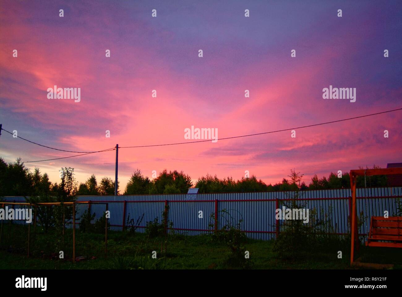 colorful summer sunset in the countryside Stock Photo - Alamy