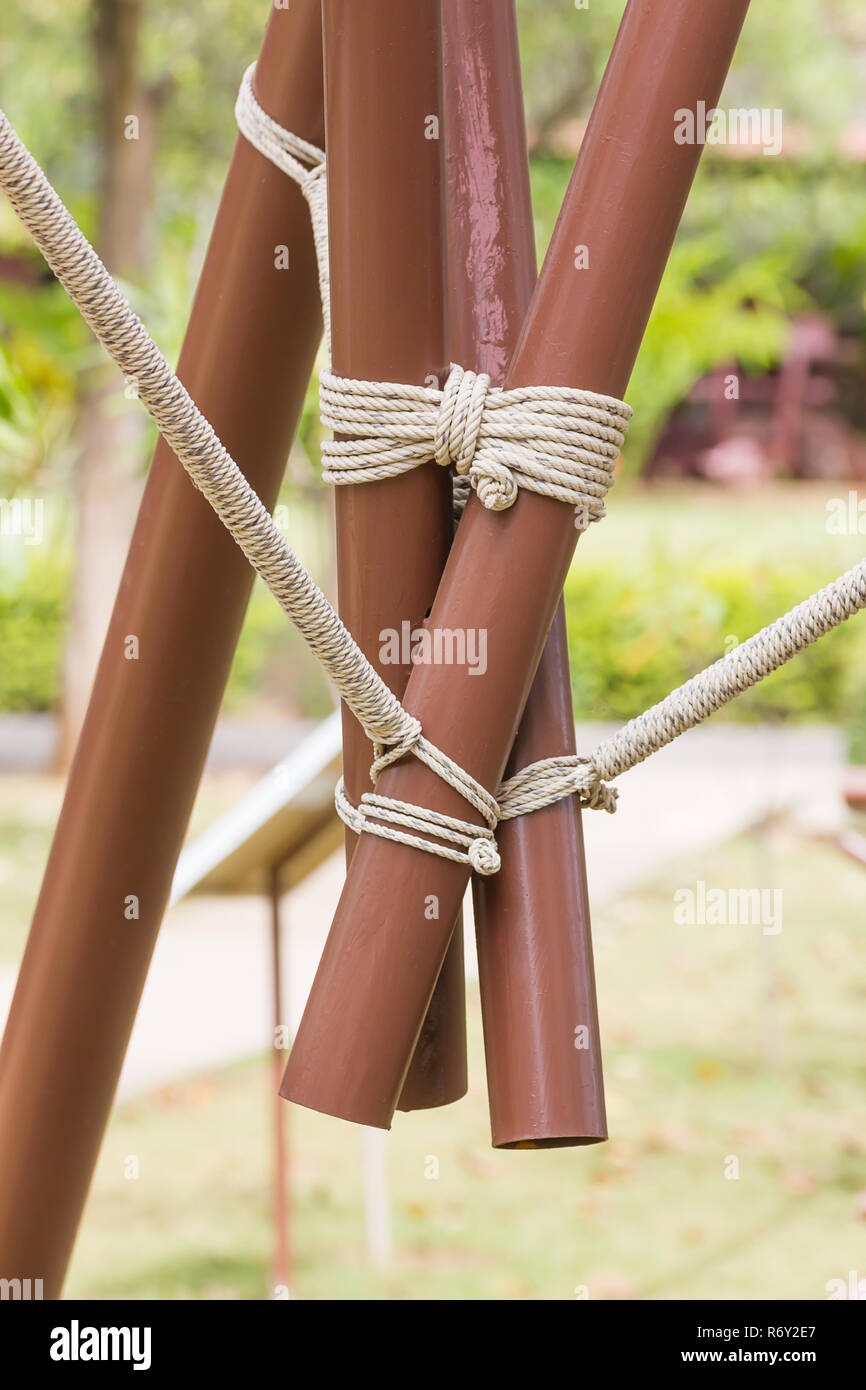 Rope knot around metal pipe Stock Photo - Alamy