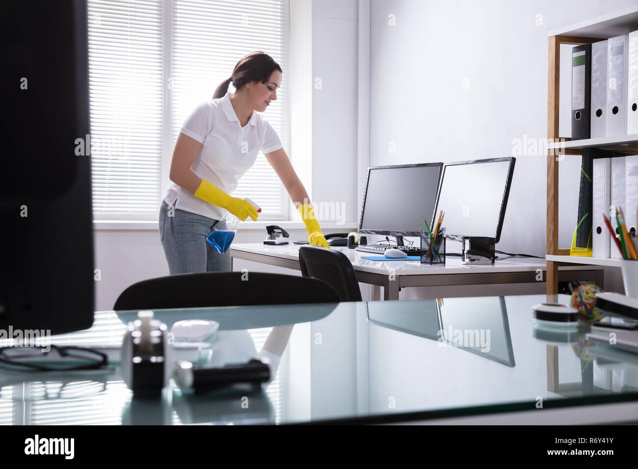 Woman wiping screen computer hi-res stock photography and images - Alamy