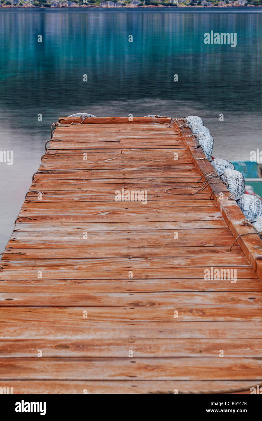 Wooden pier in the sunset Stock Photo - Alamy