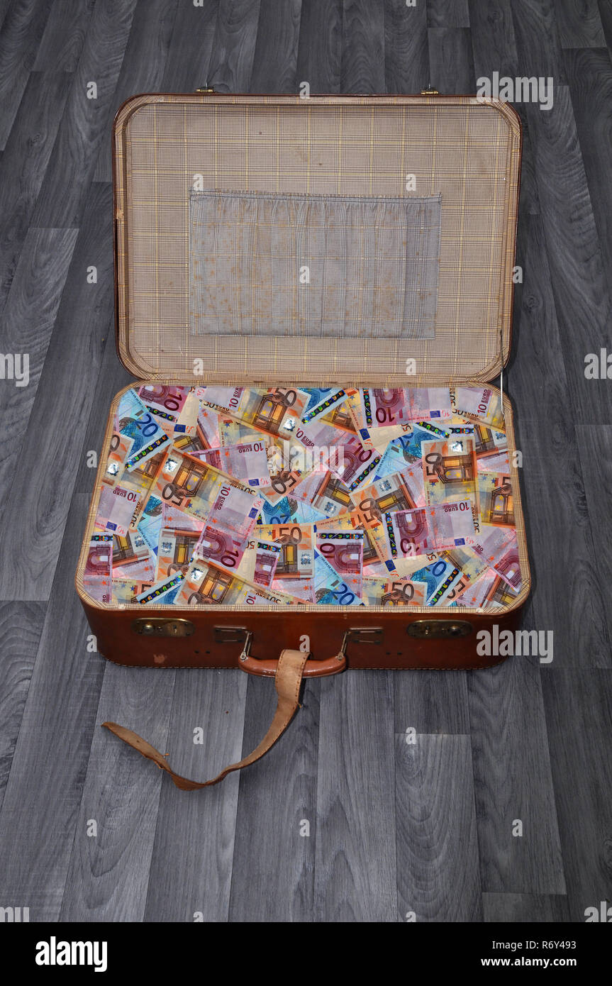 banknotes in the suitcase Stock Photo - Alamy