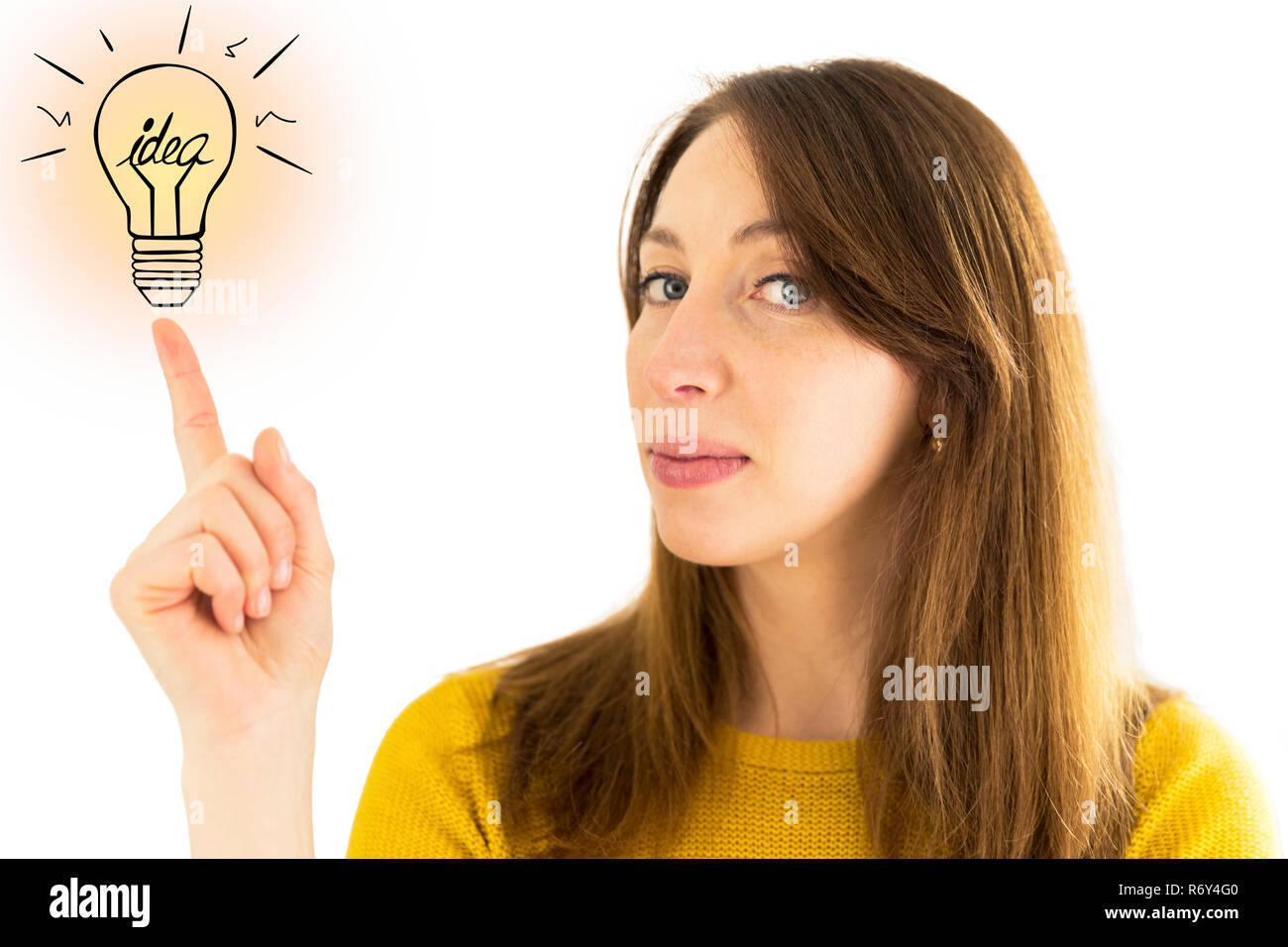 Woman pointing to illustration of light bulb. Idea concept Stock Photo ...