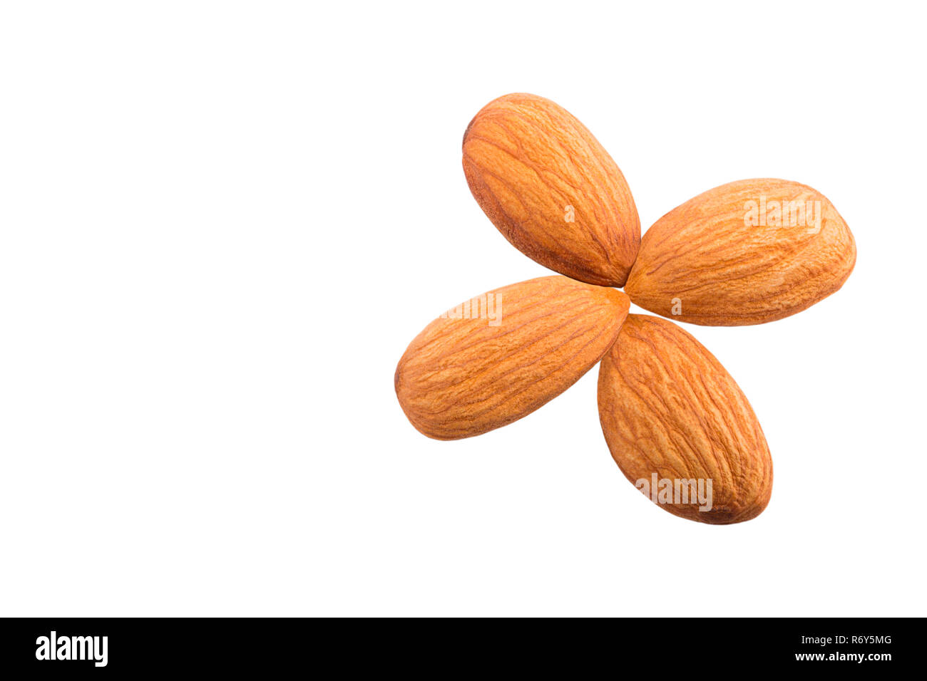 four whole almonds on white background with copy space Stock Photo - Alamy
