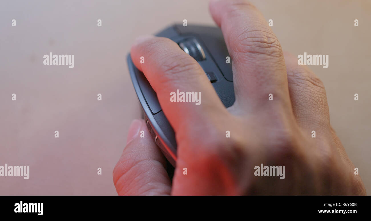 Top view of man using mouse Stock Photo - Alamy