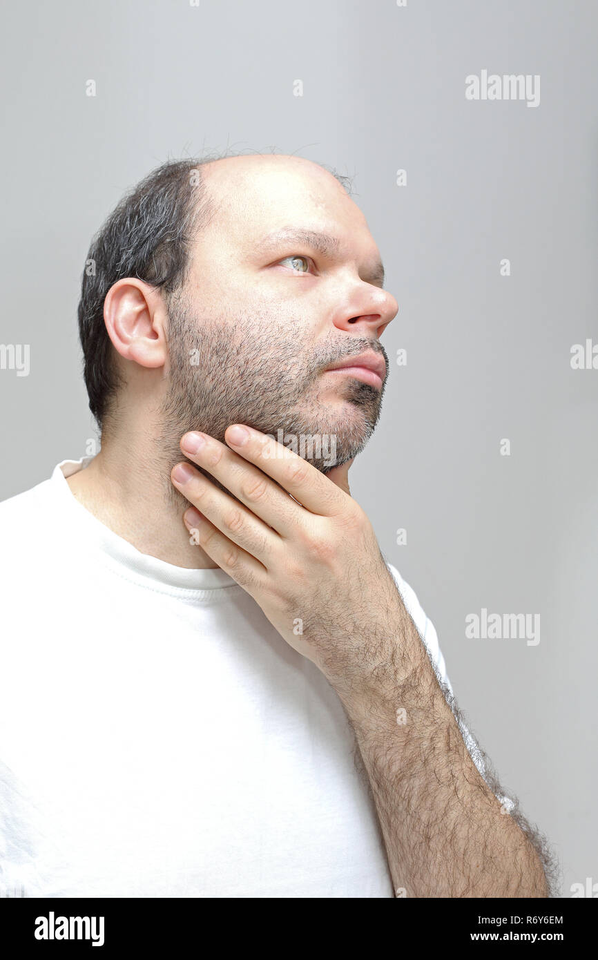 Hand in Beard Stock Photo - Alamy