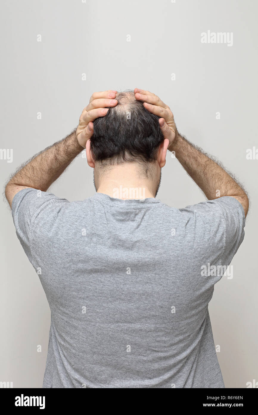 Hands on Head Stock Photo - Alamy