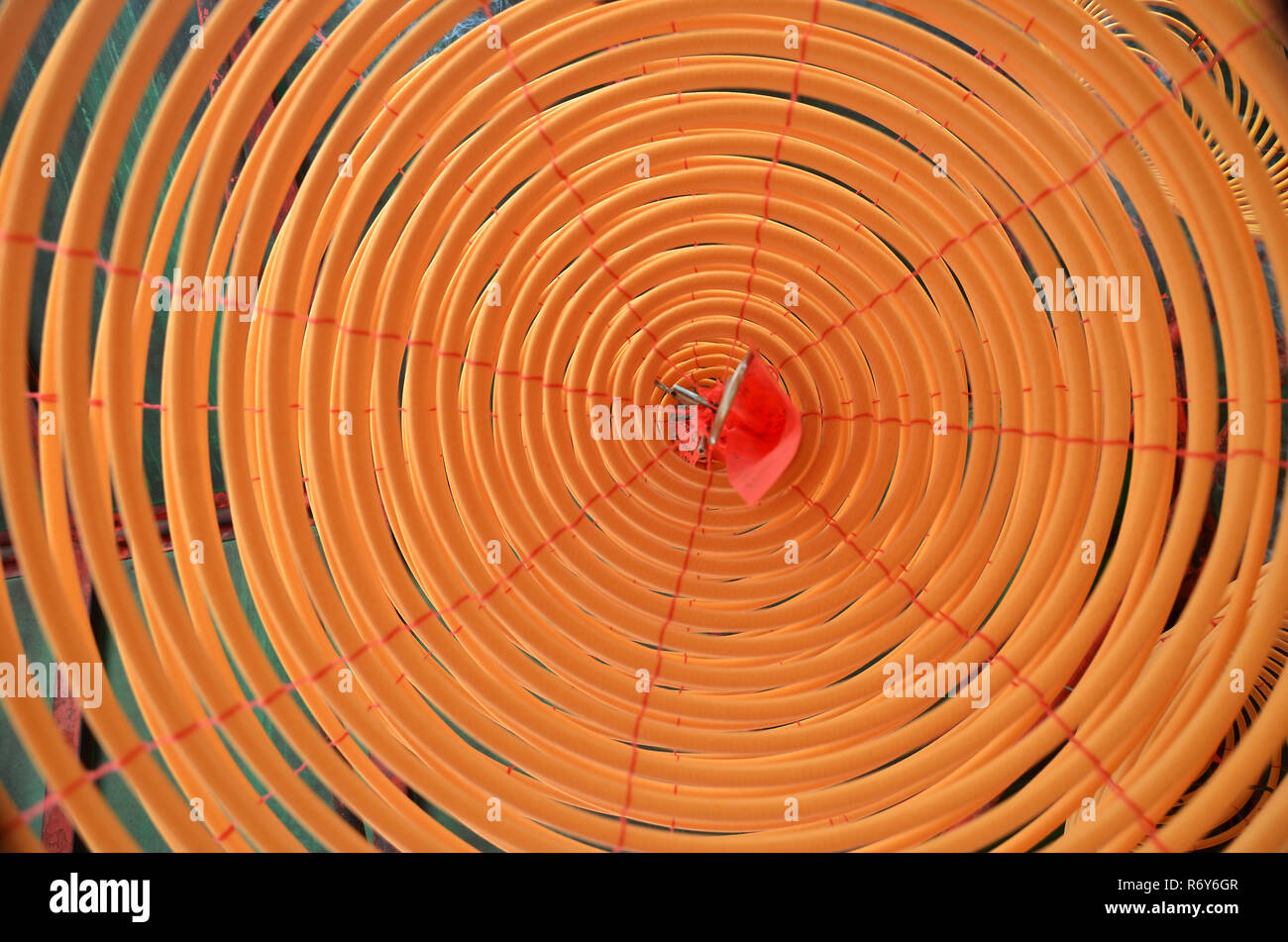 Circular incenses burning in Chinese temple Stock Photo - Alamy