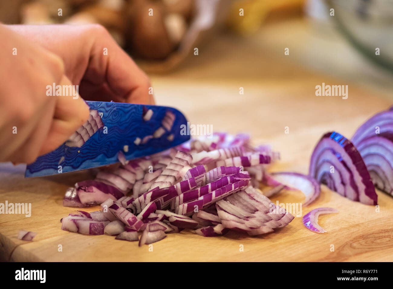 Chopping Red Onion Stock Photo - Alamy