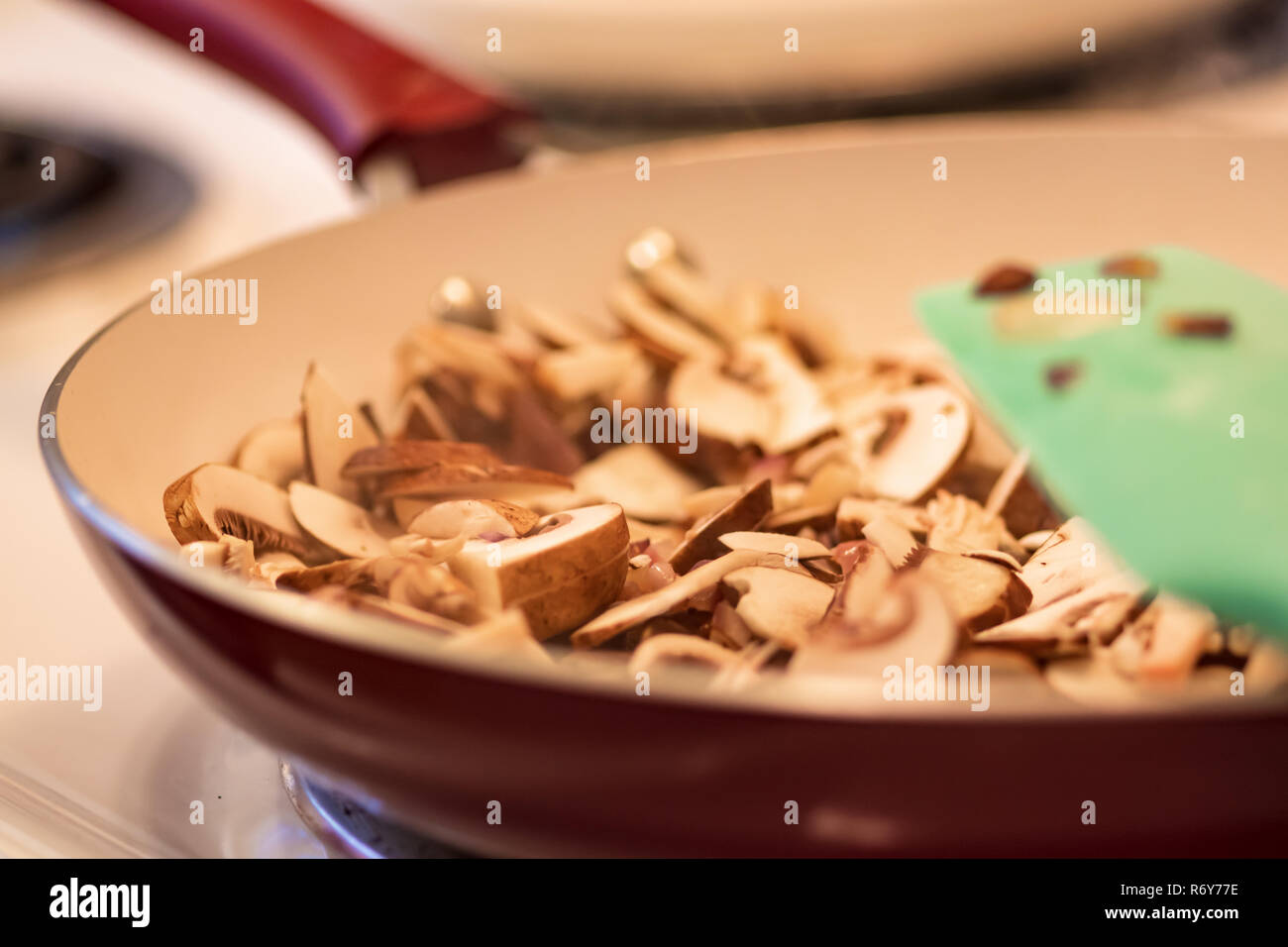 Slicing mushrooms in white kitchen hi-res stock photography and images ...