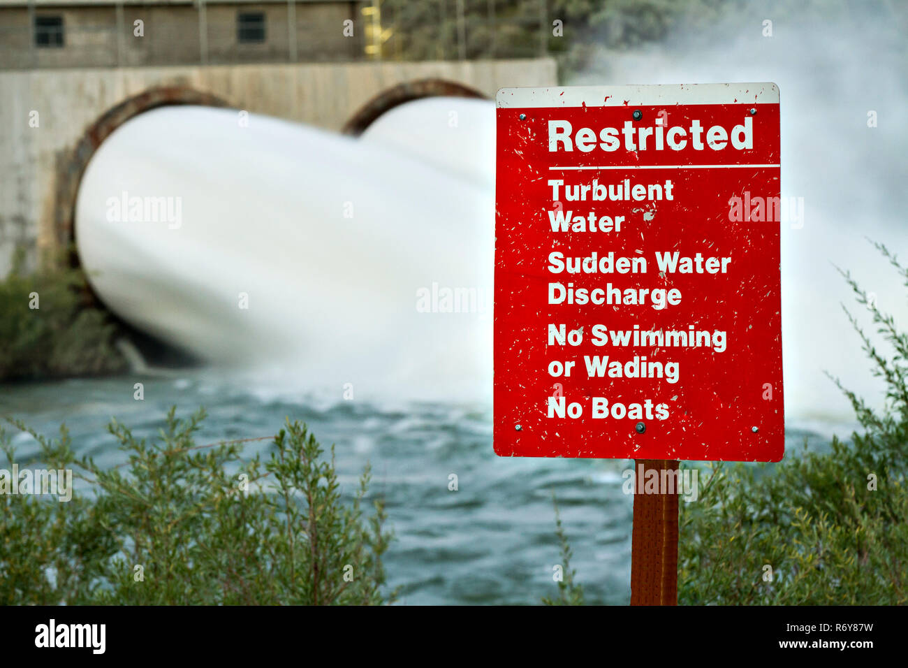 sign warning people Stock Photo - Alamy